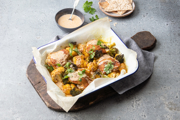Curried Chicken Tray Bake with Coconut Sauce